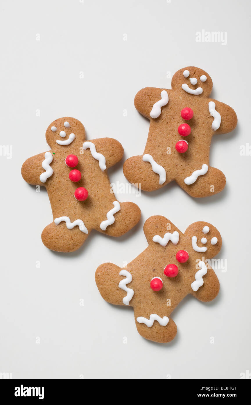 Three gingerbread men Stock Photo - Alamy