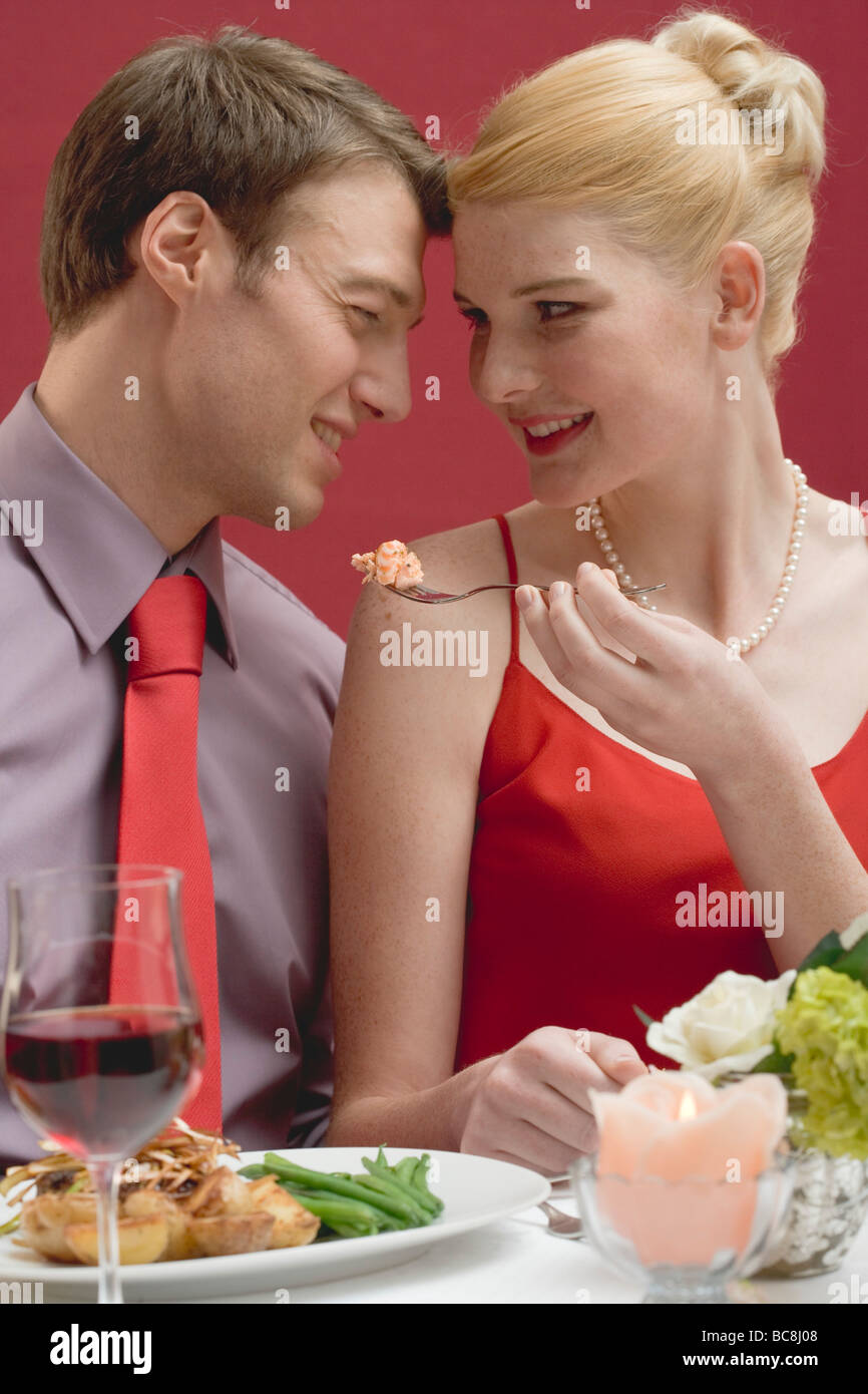 Couple having romantic dinner in restaurant Stock Photo - Alamy