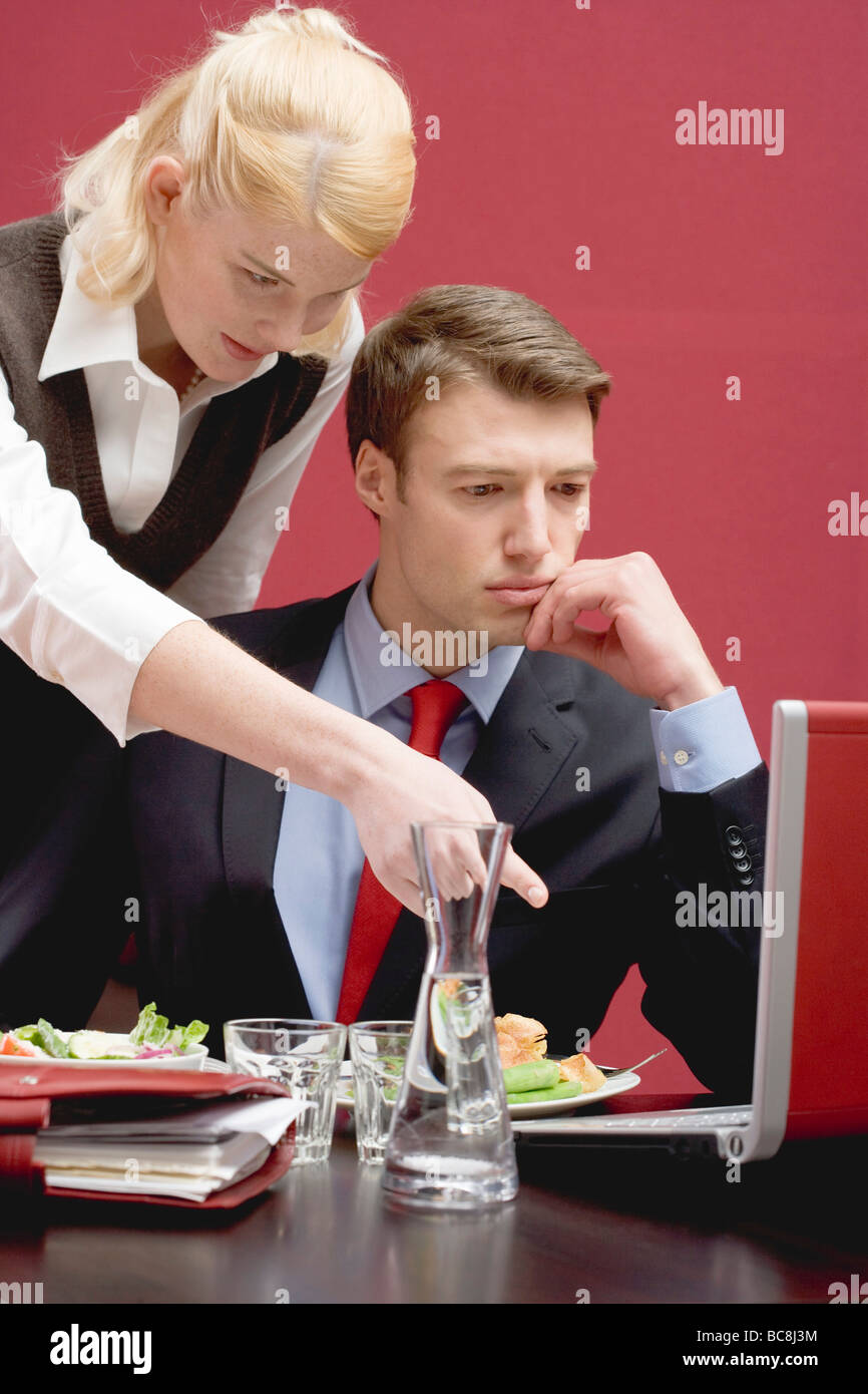 Office colleagues working through lunch Stock Photo - Alamy