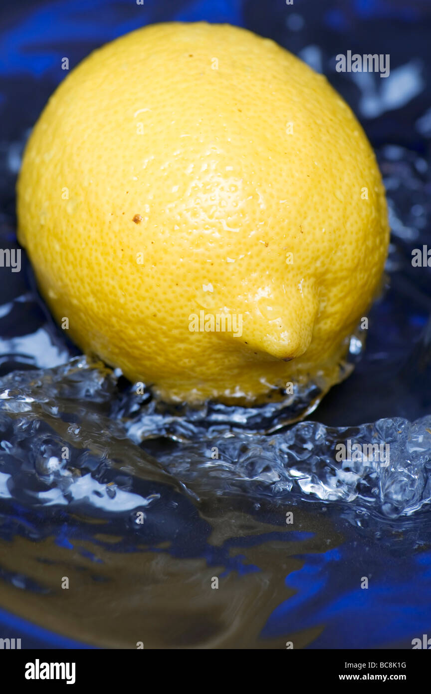 object on blue food lemon in the water Stock Photo - Alamy