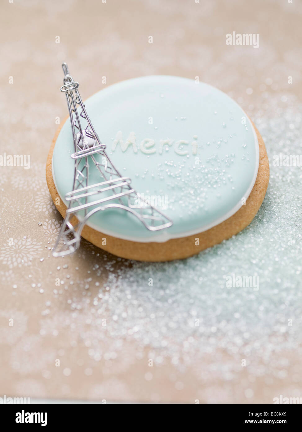 Biscuit with blue icing and the word Merci (France Stock Photo - Alamy