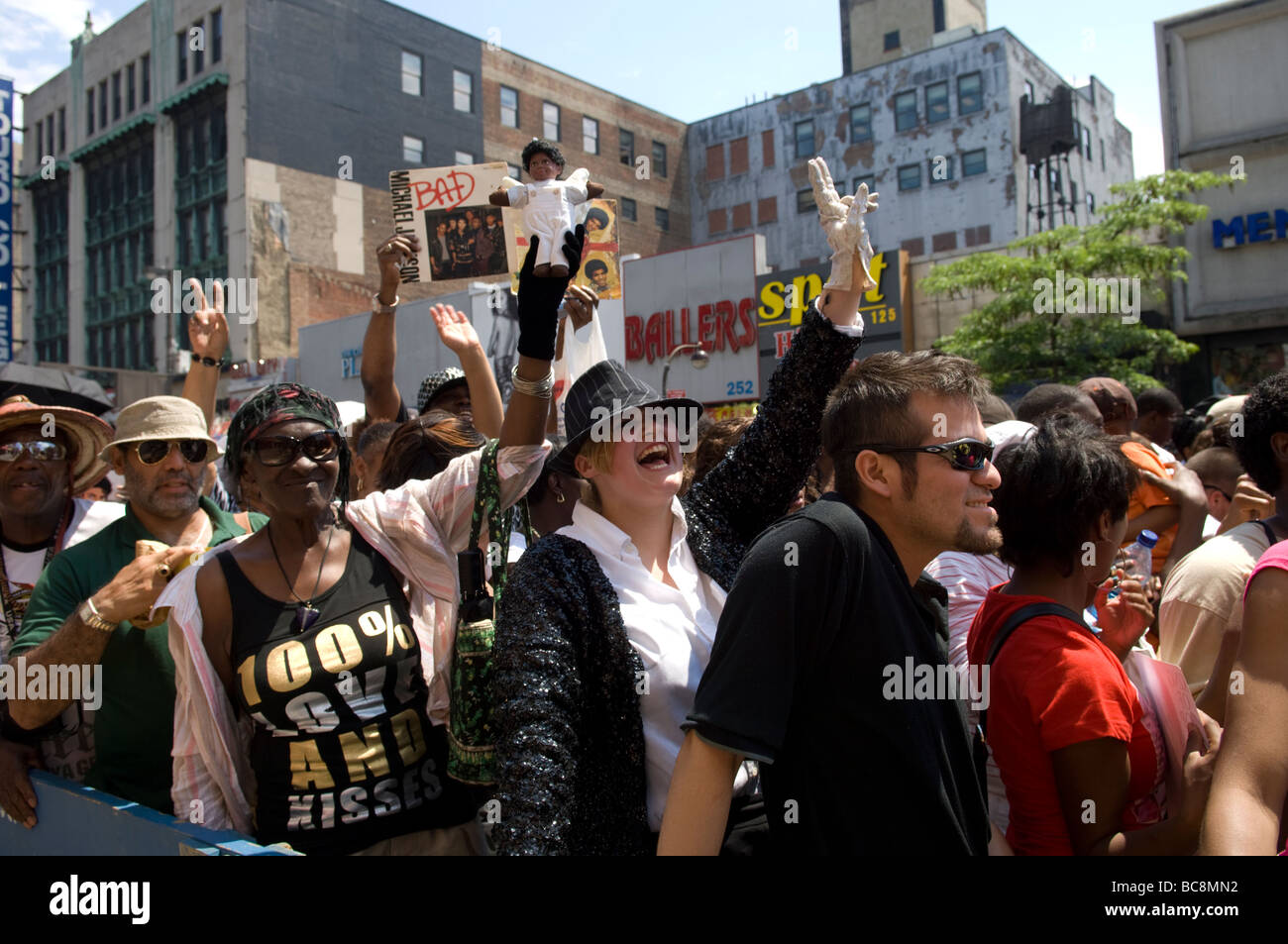 Thousands of Michael Jackson fans gather outside the Apollo Theater in ...