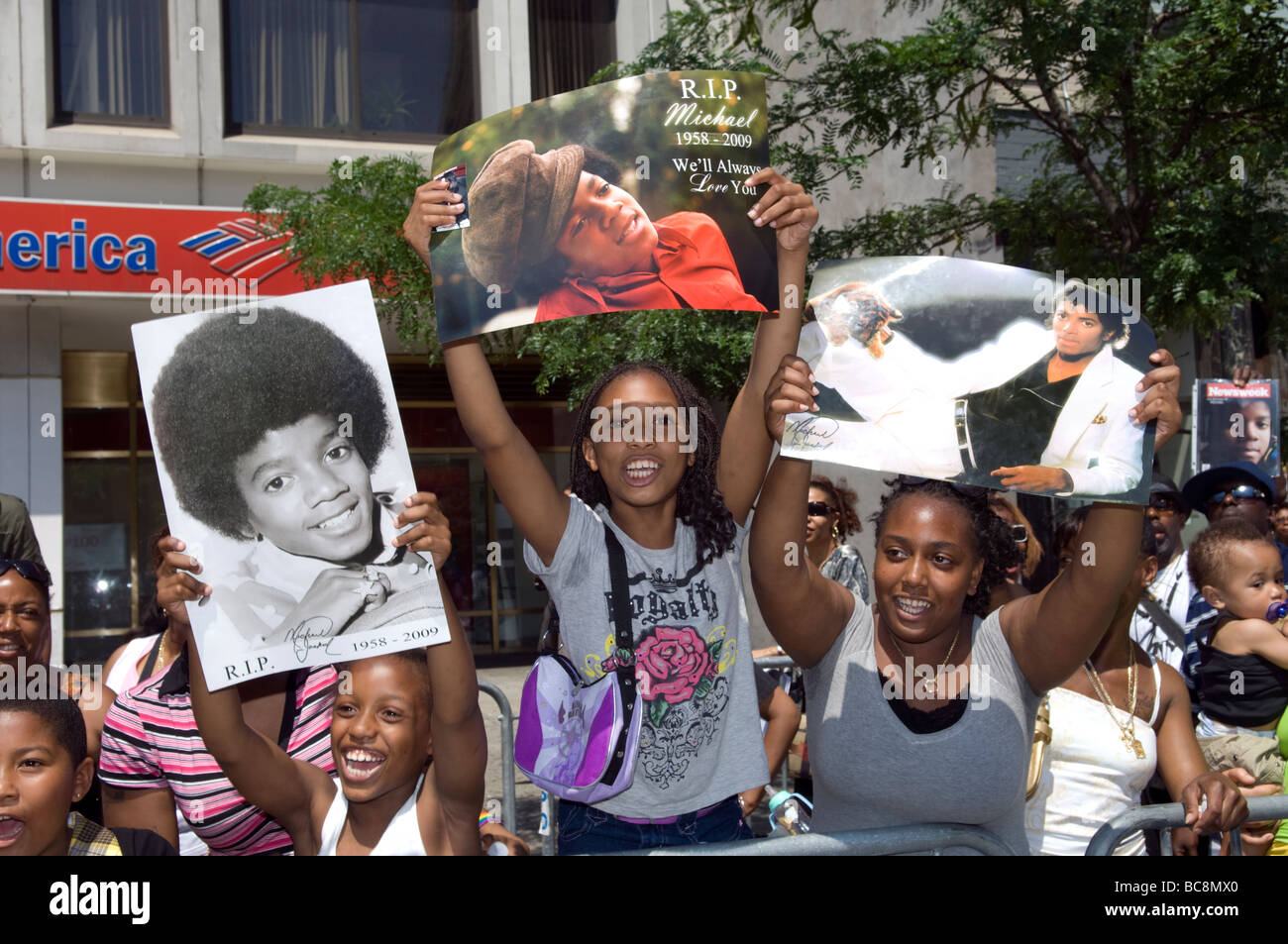 Thousands of Michael Jackson fans gather outside the Apollo Theater in ...
