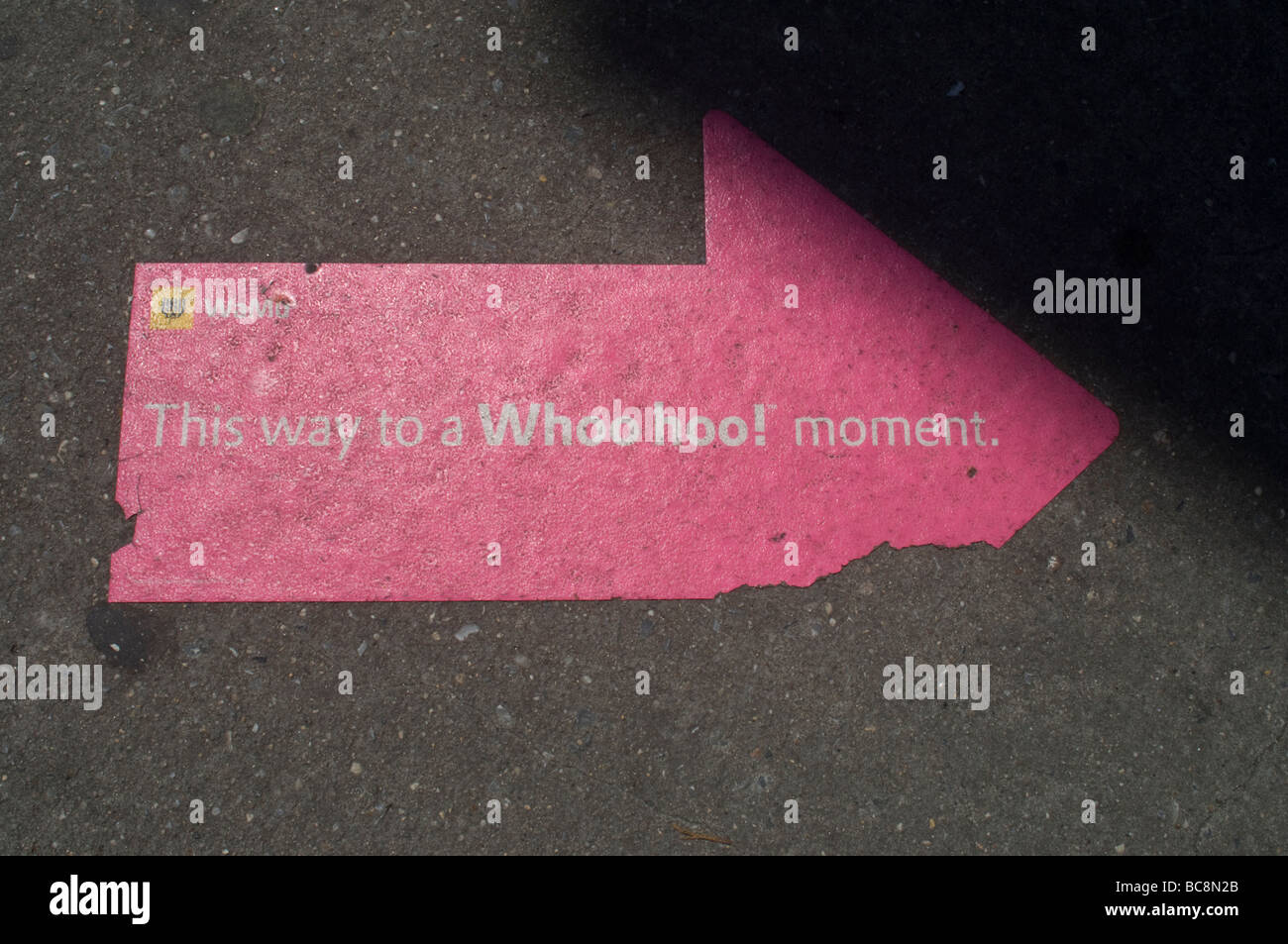 An ad for a Wamu bank on the sidewalk in Astoria Queens in New York on ...