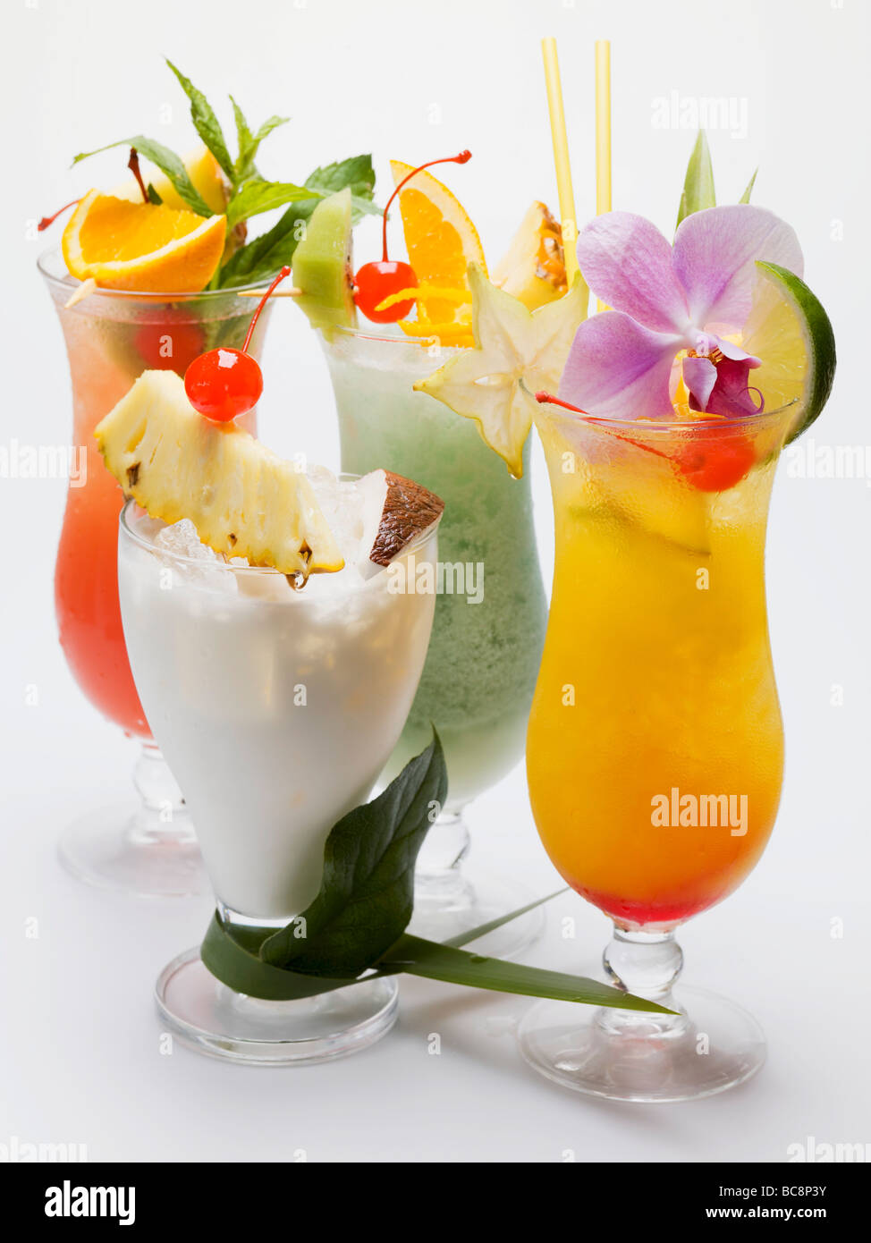 Four different long drinks Stock Photo - Alamy