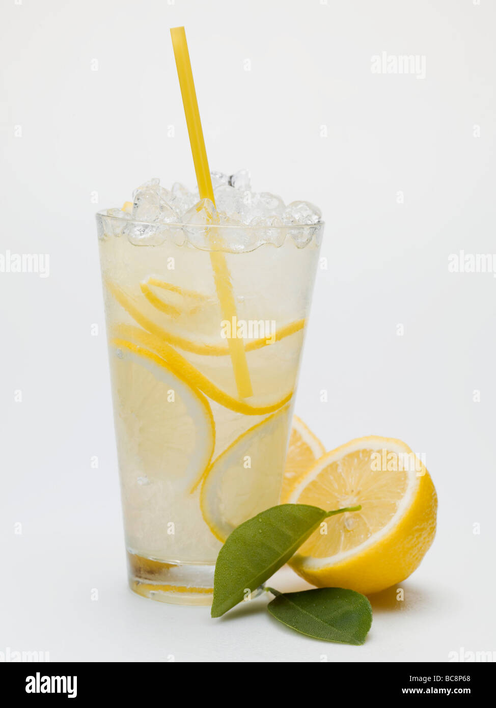 A glass of lemonade with crushed ice and straw Stock Photo - Alamy