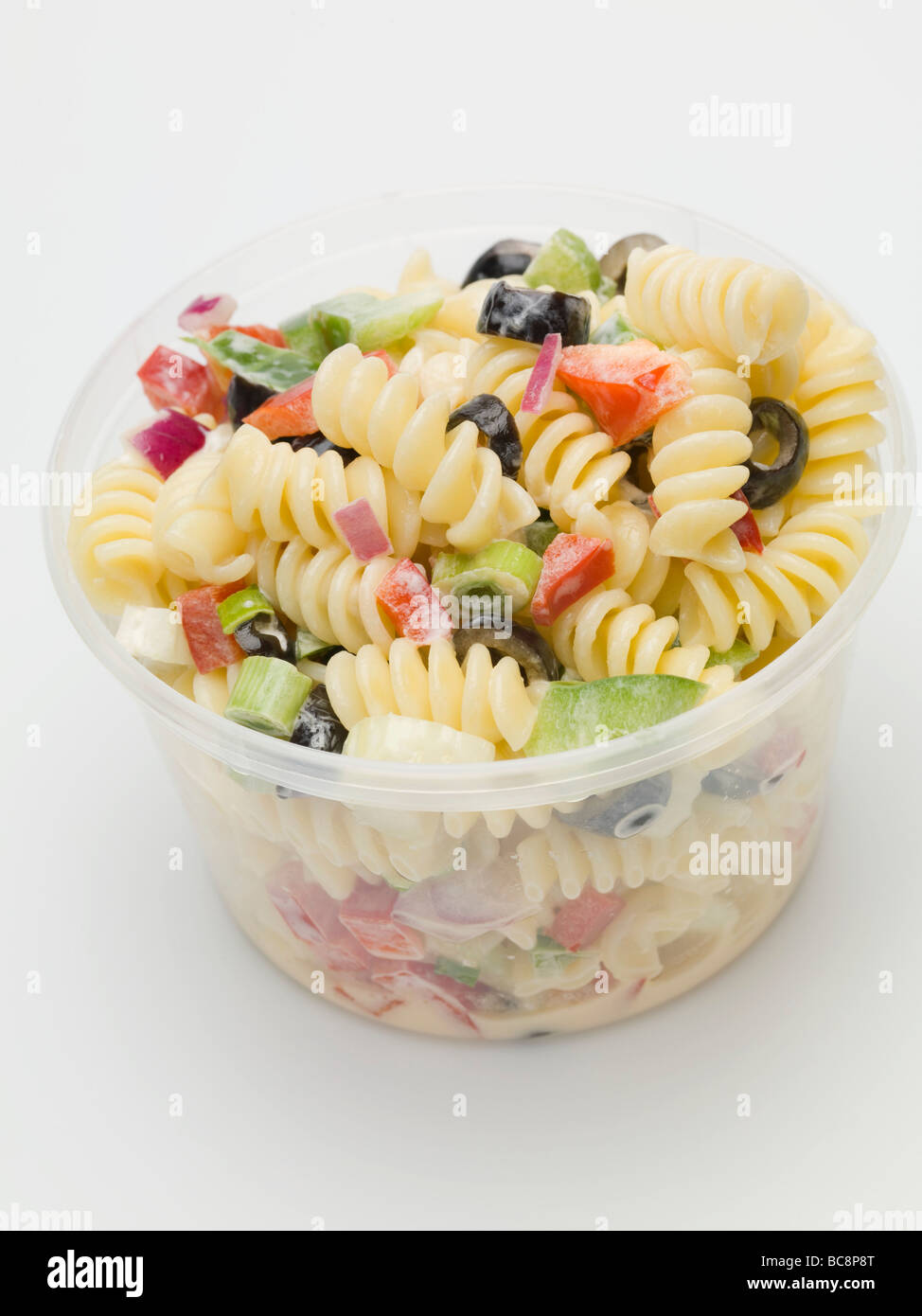Pasta and vegetable salad in plastic container Stock Photo - Alamy