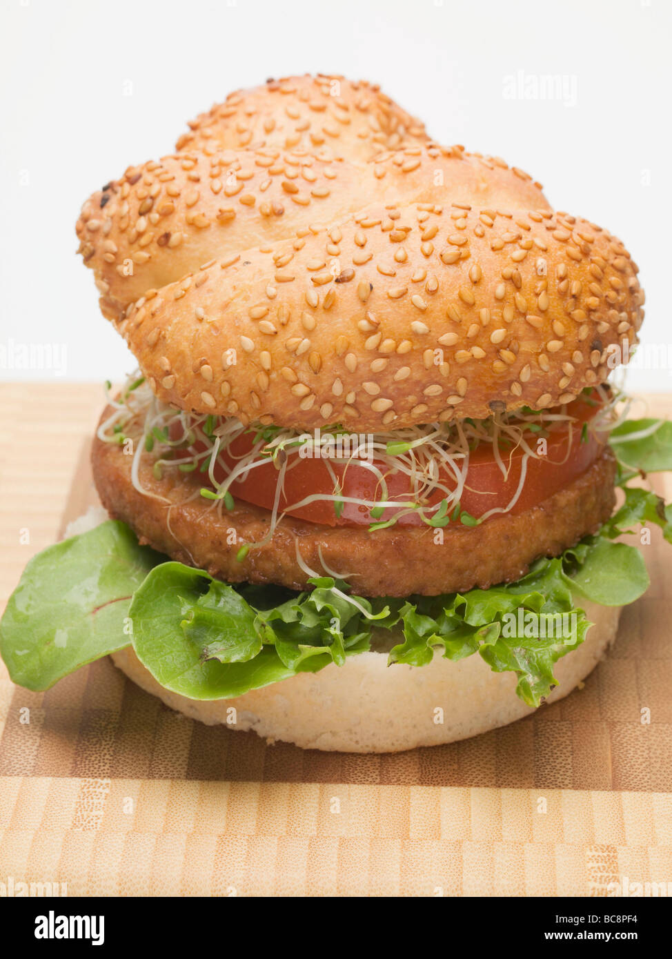 Burger with sprouts and tomato Stock Photo - Alamy