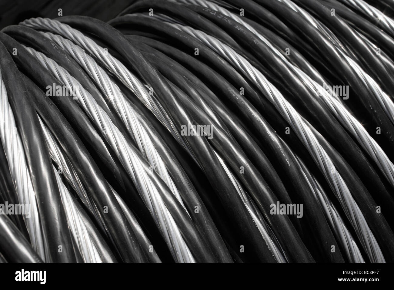 Large gauge electric cables on a spool Stock Photo - Alamy