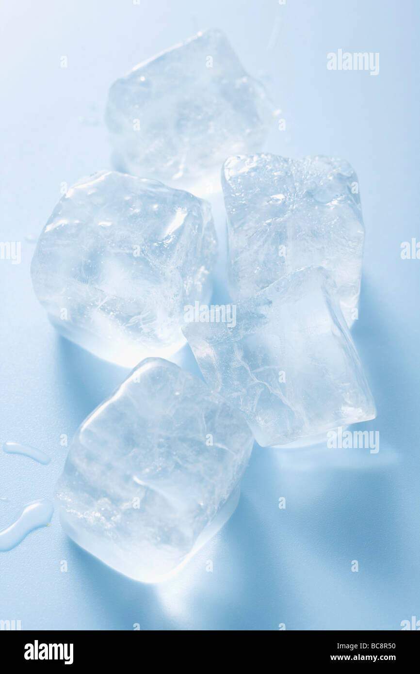 Five ice cubes Stock Photo - Alamy