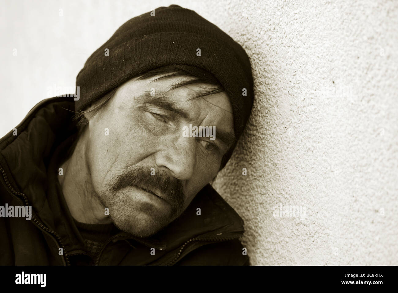 Homeless man on a city street Stock Photo - Alamy