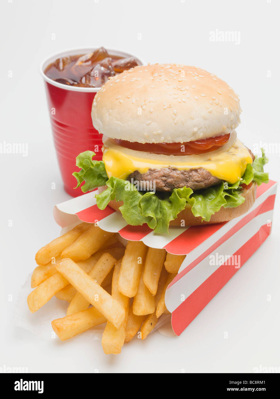 Cheeseburger, chips and cola Stock Photo - Alamy