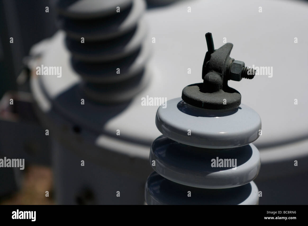 Terminal on top of insulator Electric distribution transformer Stock ...