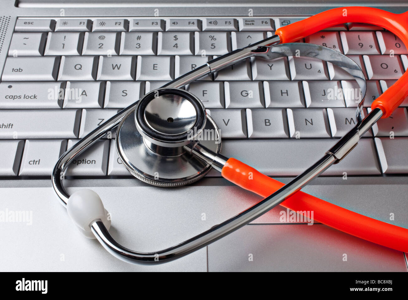 Laptop computer and stethoscope Stock Photo - Alamy