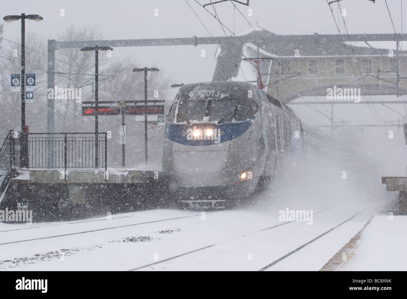 An Amtrak Acela high speed passenger train passes through the Old ...