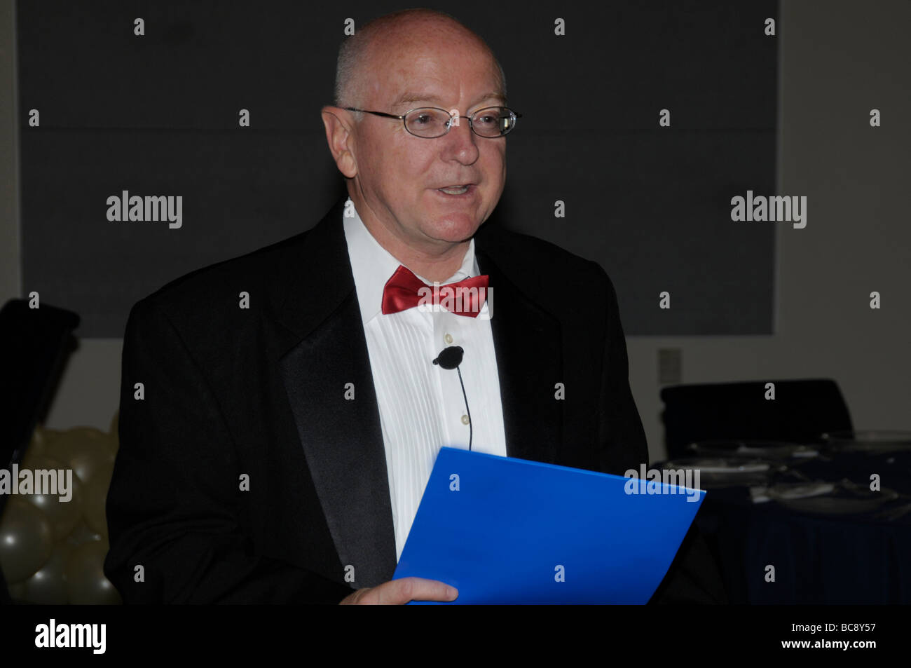 master of ceremonies at a 50th anniversary event Stock Photo - Alamy