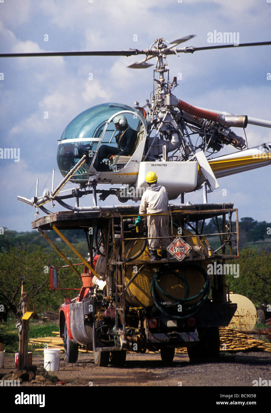 Helicopter spraying crops hi-res stock photography and images - Alamy