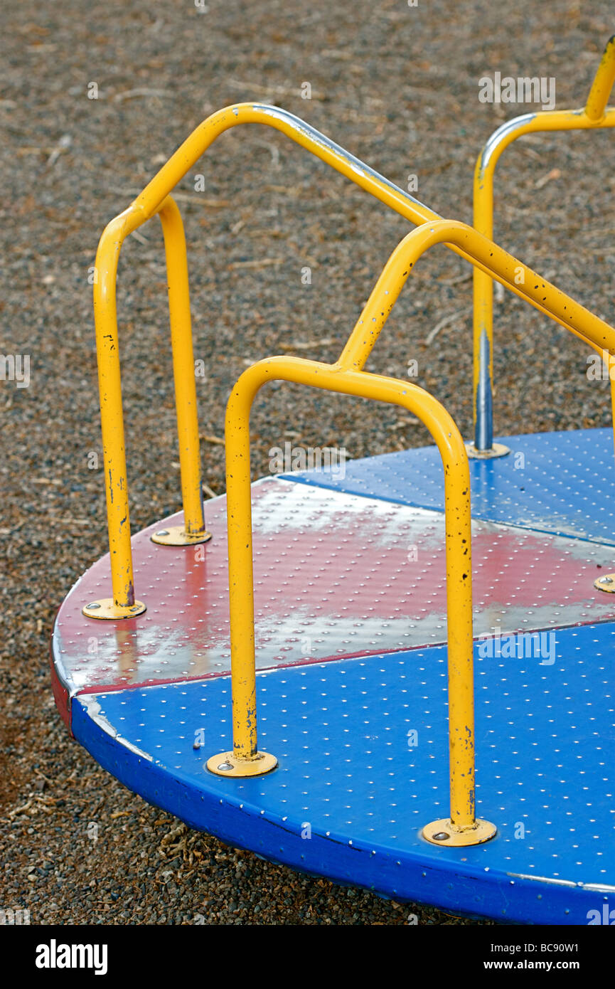 Elements of a merry go round at a cold autumn play ground Stock Photo ...