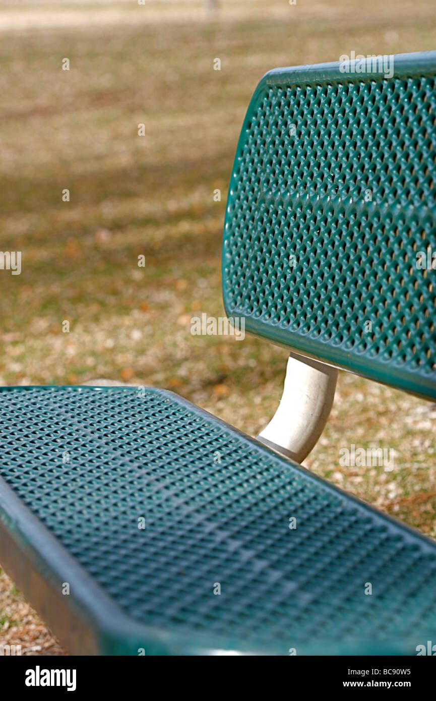 Shallow depth of focus on a green play ground bench Stock Photo - Alamy