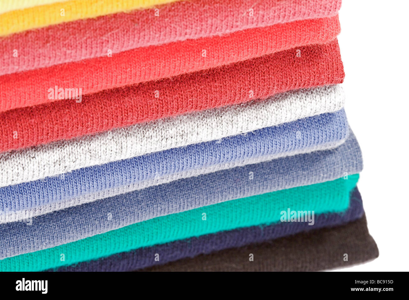 Multi Colored Tee Shirts stacked in a neat pile Stock Photo - Alamy
