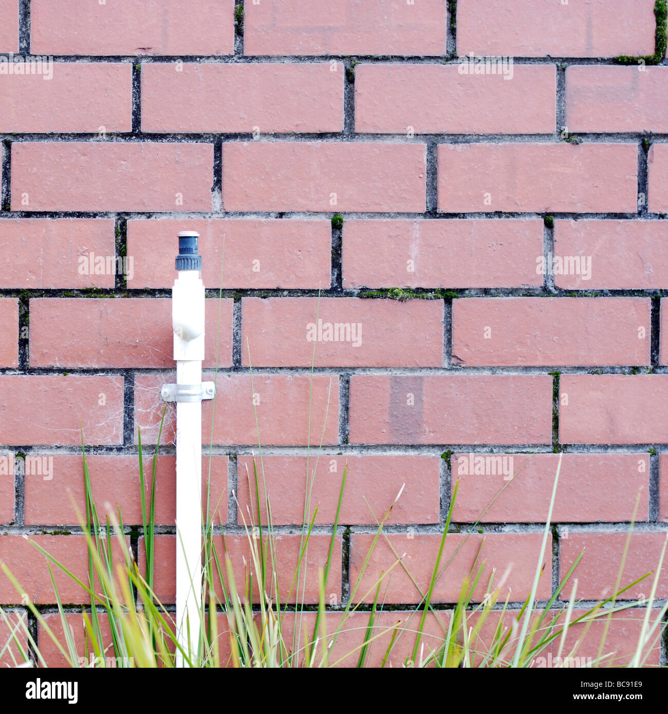 A town centre sprinkler system for watering border plants Stock Photo ...