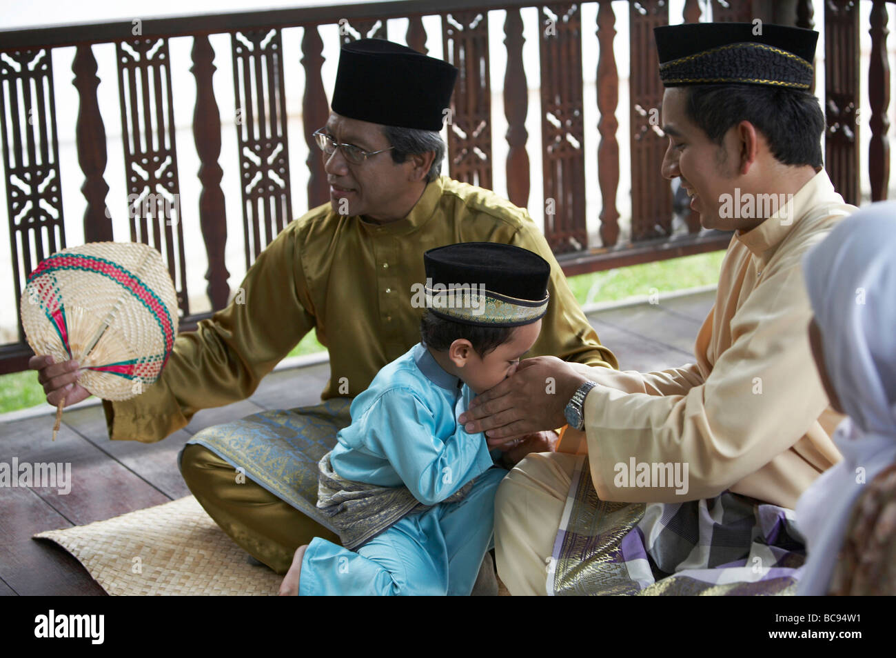 kid greeting to family member Stock Photo - Alamy