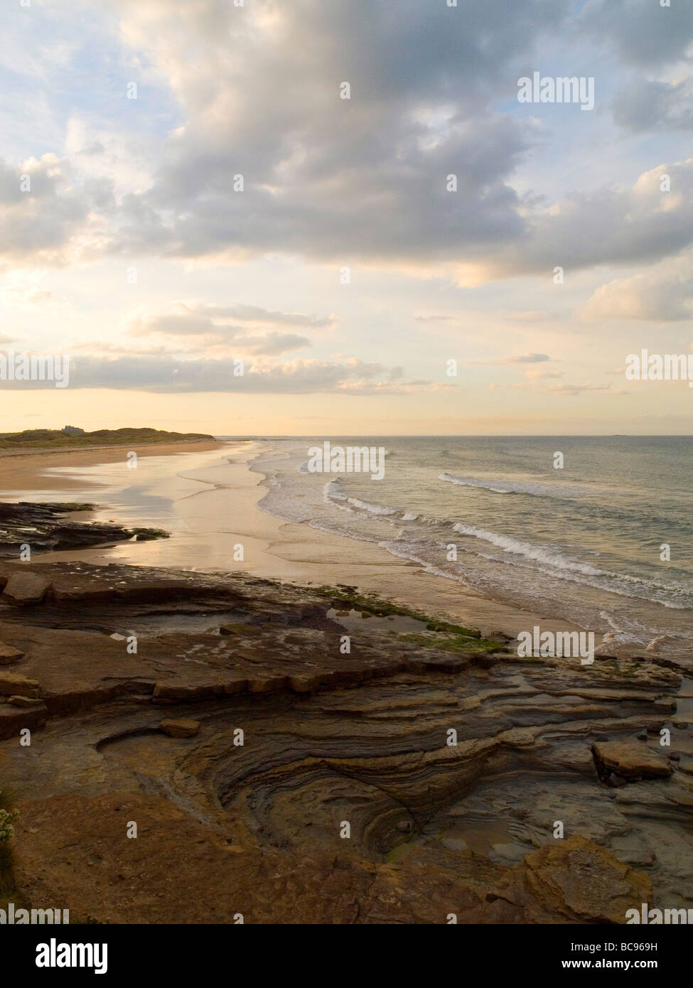 Sunset on the beach at Seahouses, Northumberland England UK Stock Photo ...