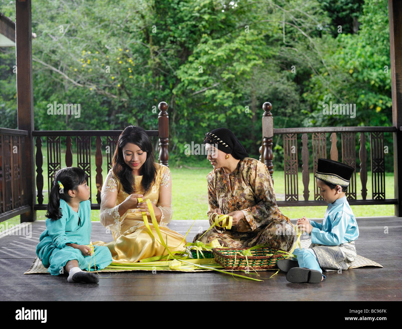 two generation family preparing for the raya Stock Photo - Alamy