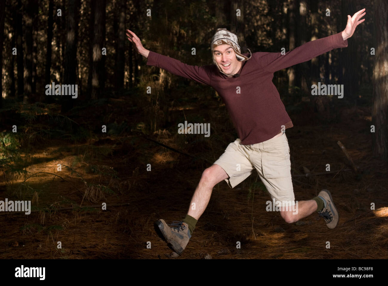 Man enjoying nature in a forest Stock Photo - Alamy