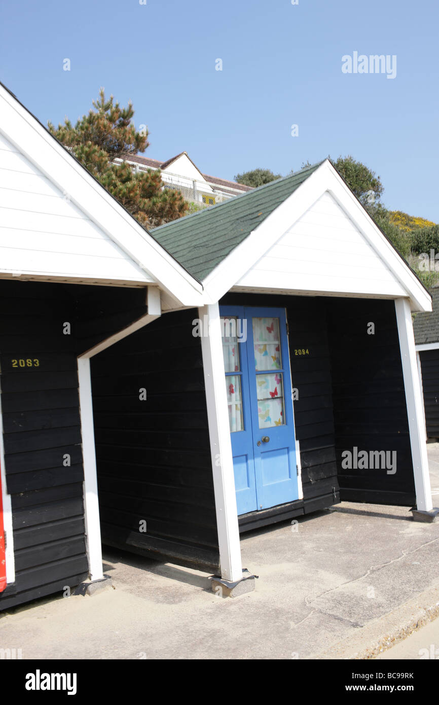 Beach beaches front hut huts row sea seafront seaside hi-res stock ...
