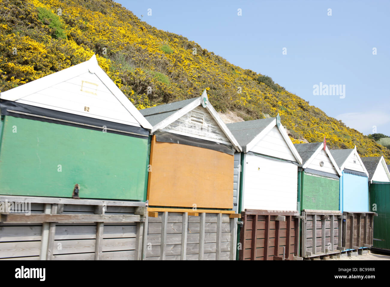 Beach beaches front hut huts row sea seafront seaside hi-res stock ...