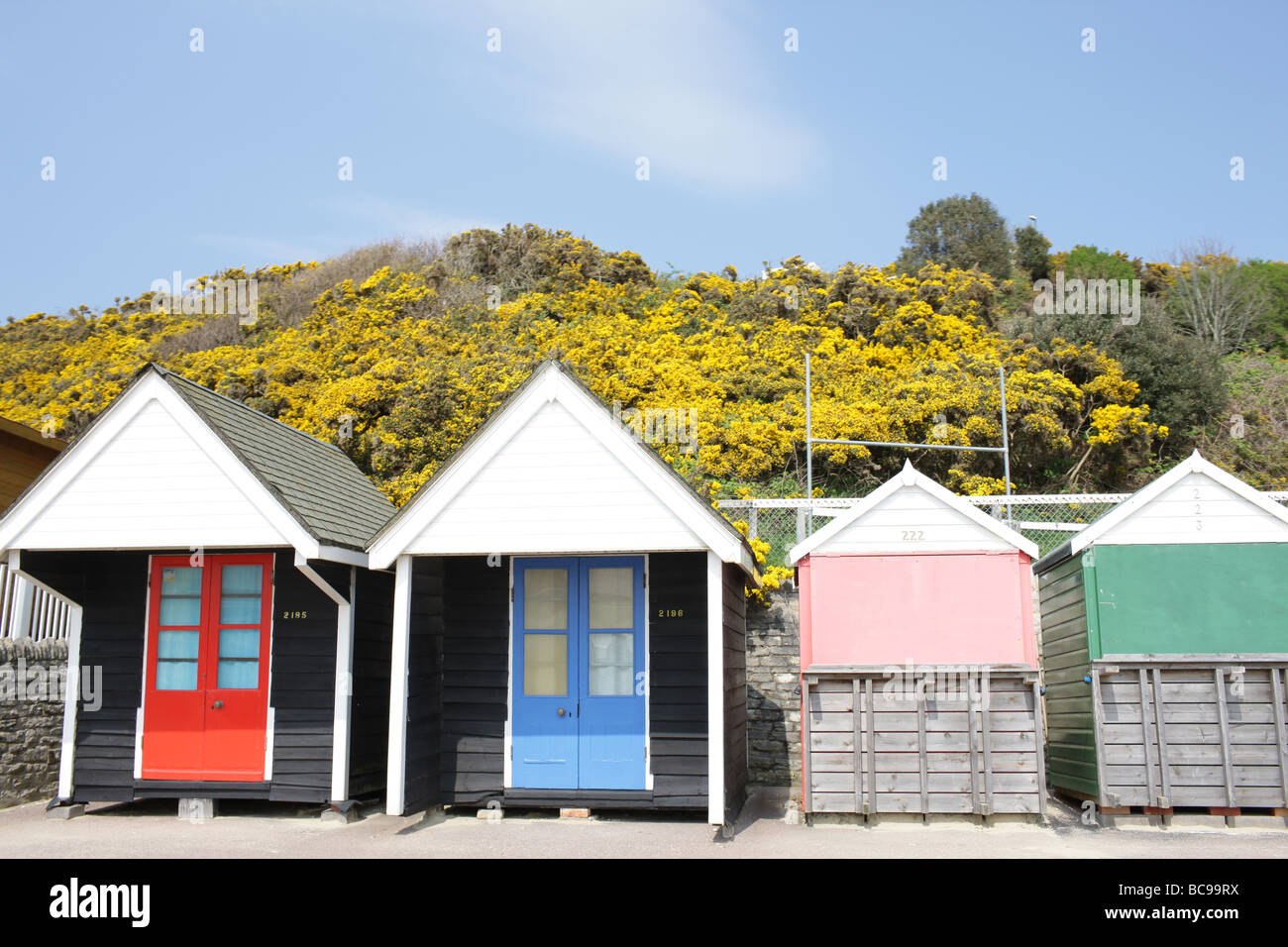 Beach beaches front hut huts row sea seafront seaside hi-res stock ...