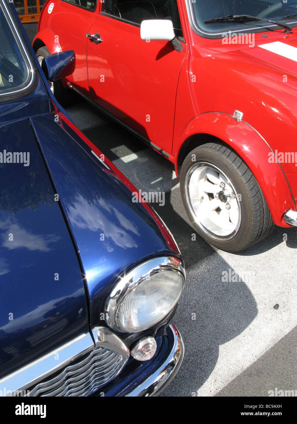 two old style mini cars in street in sun Stock Photo - Alamy