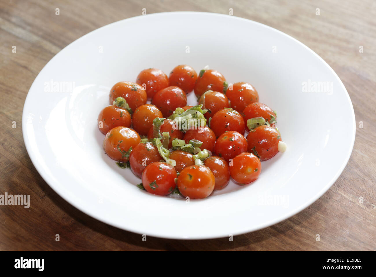Cherry Tomato and Spring Onion Salad Stock Photo - Alamy