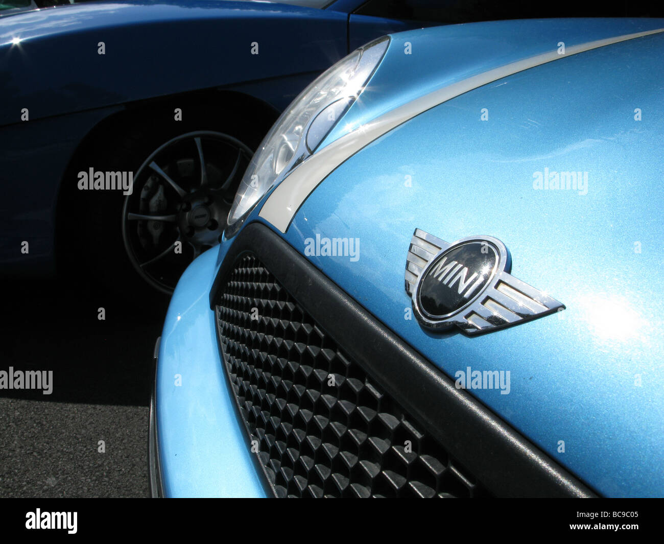 manufacturer's logo on mini car in street Stock Photo - Alamy