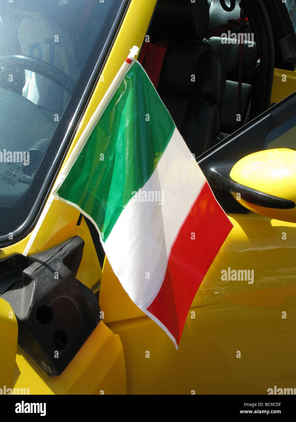italian flag on car window in sun Stock Photo - Alamy