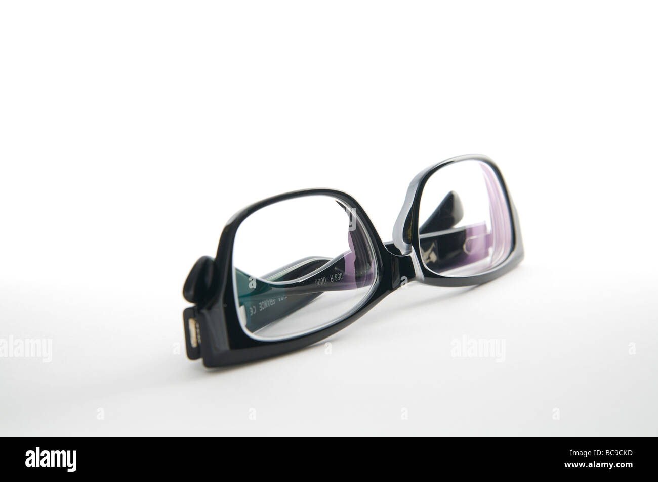 Closed old fashioned spectacles against a white background Stock Photo ...