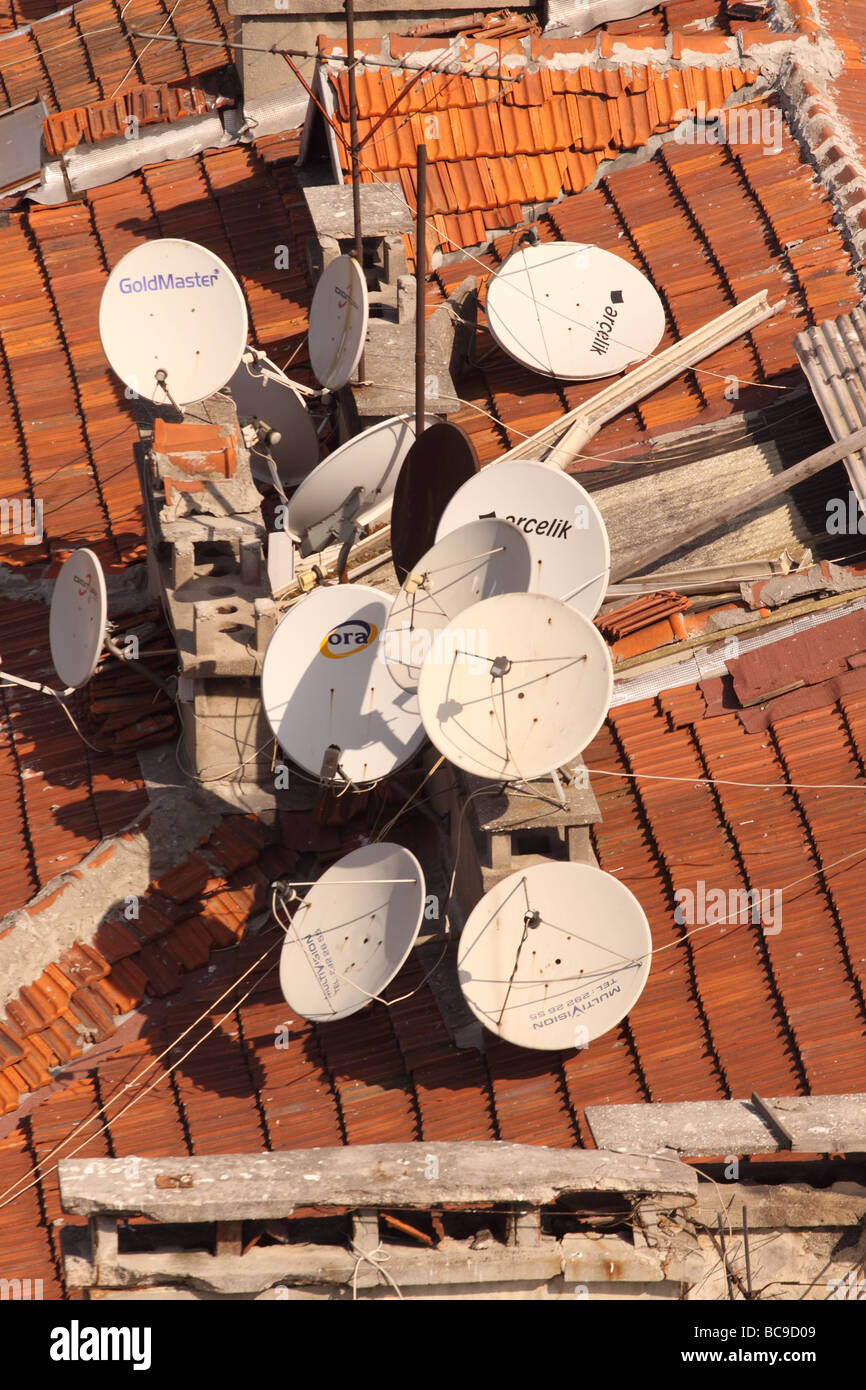 Satellite TV dishes aerials on the roof of housing in Istanbul Turkey ...
