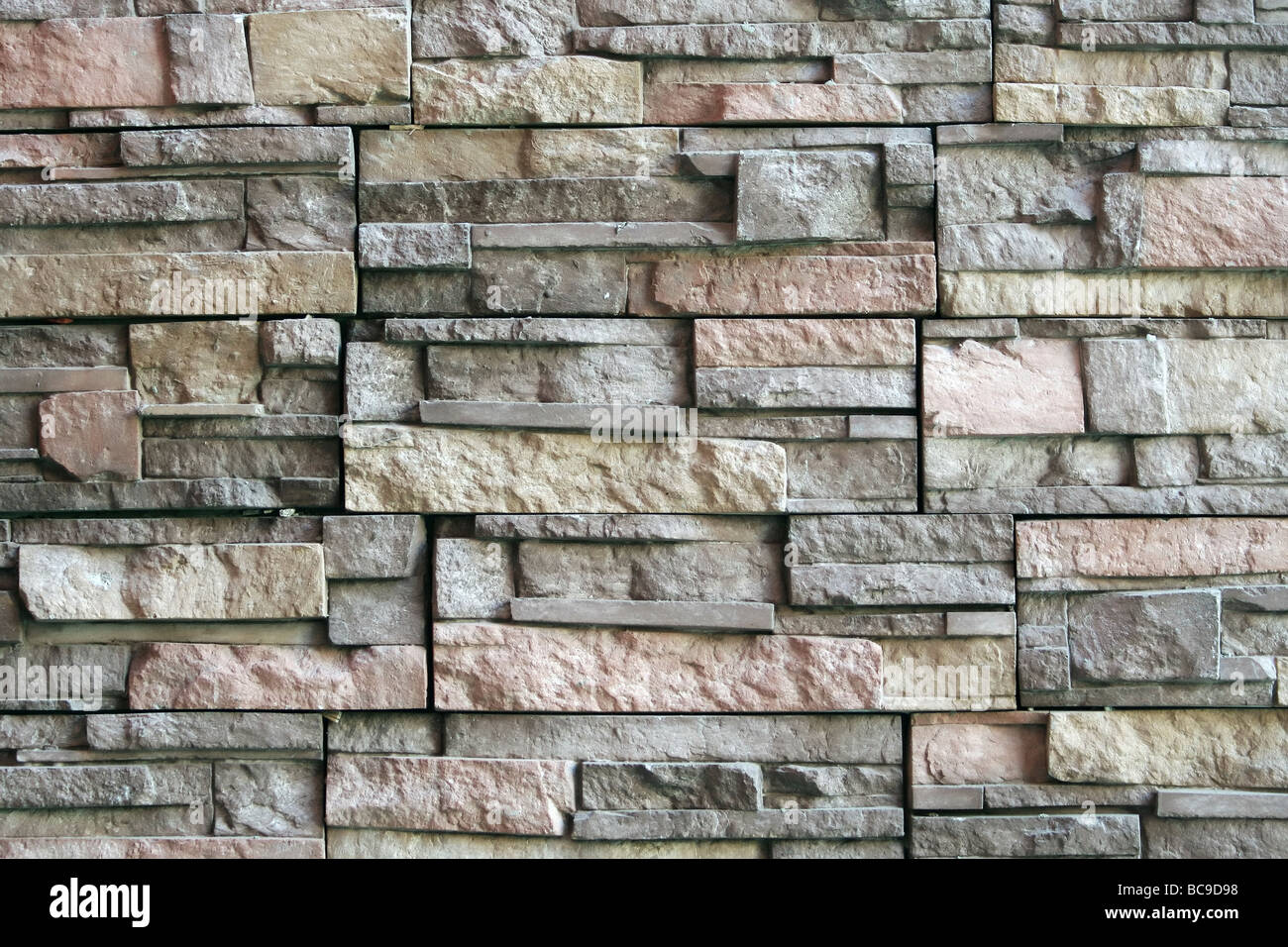 Stone wall stacked brick facade hi-res stock photography and images - Alamy