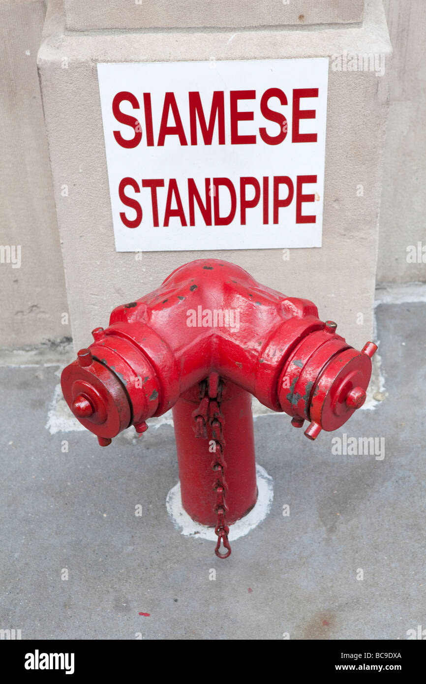 Siamese standpipe in NYC Stock Photo - Alamy