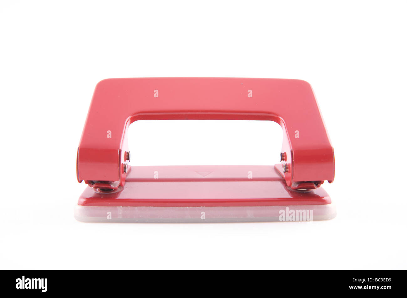 A paper punch isolated against a white background Stock Photo - Alamy