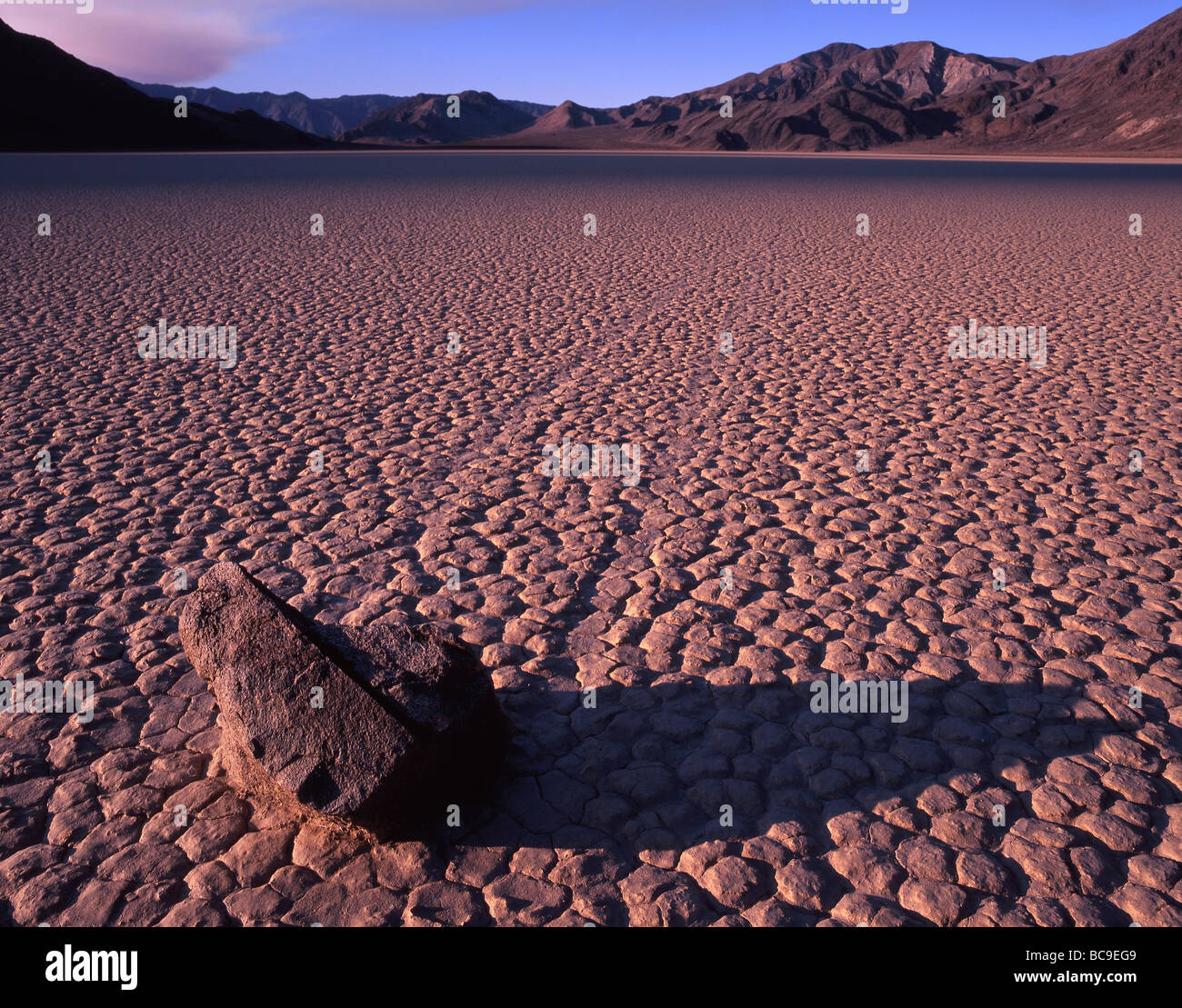 Moving rock in the desert of Death Valley Stock Photo - Alamy