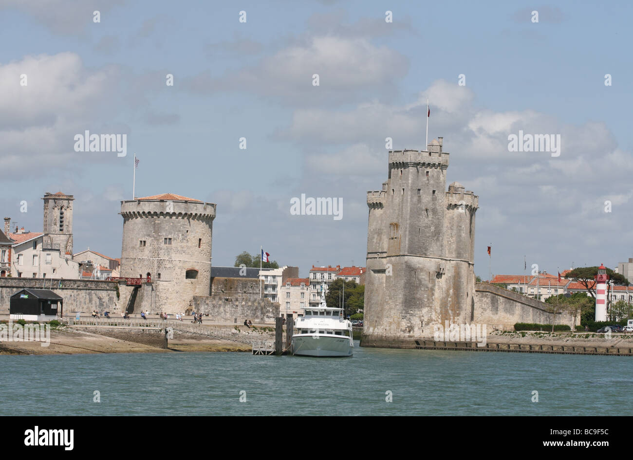 ancient stone towers guarding entrance to harbour La Rochelle harbor ...