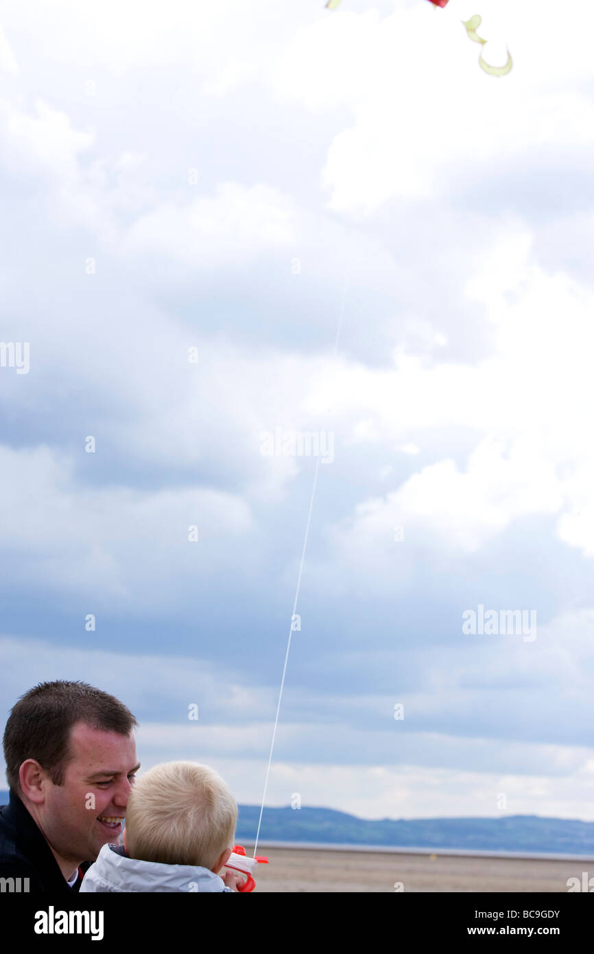 Flying kite beach hi-res stock photography and images - Alamy
