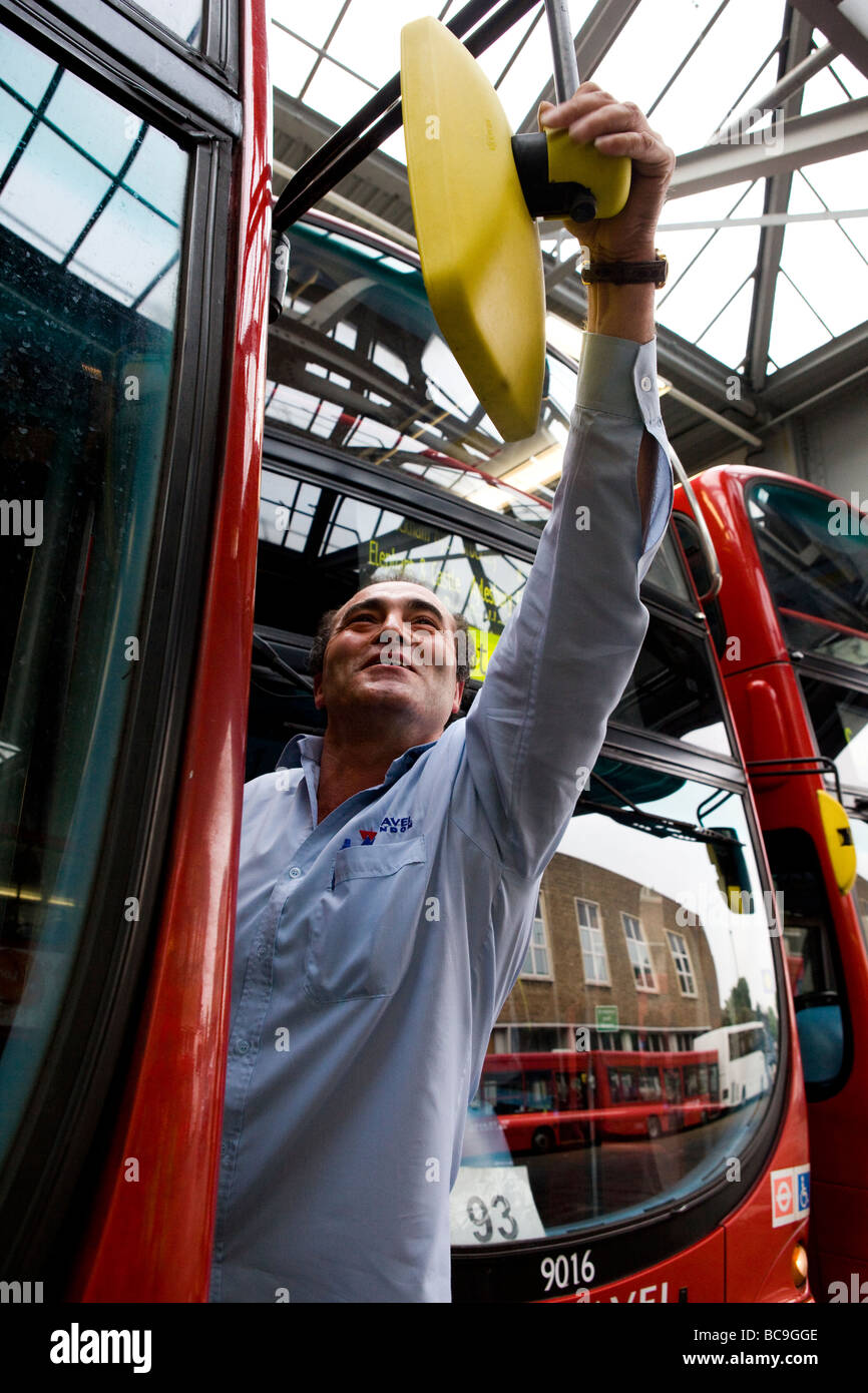 bus mechanic technician fix double decker London Stock Photo - Alamy