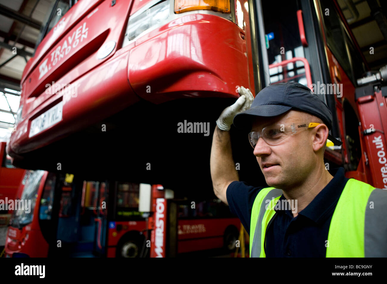 bus mechanic technician fix double decker London Stock Photo - Alamy