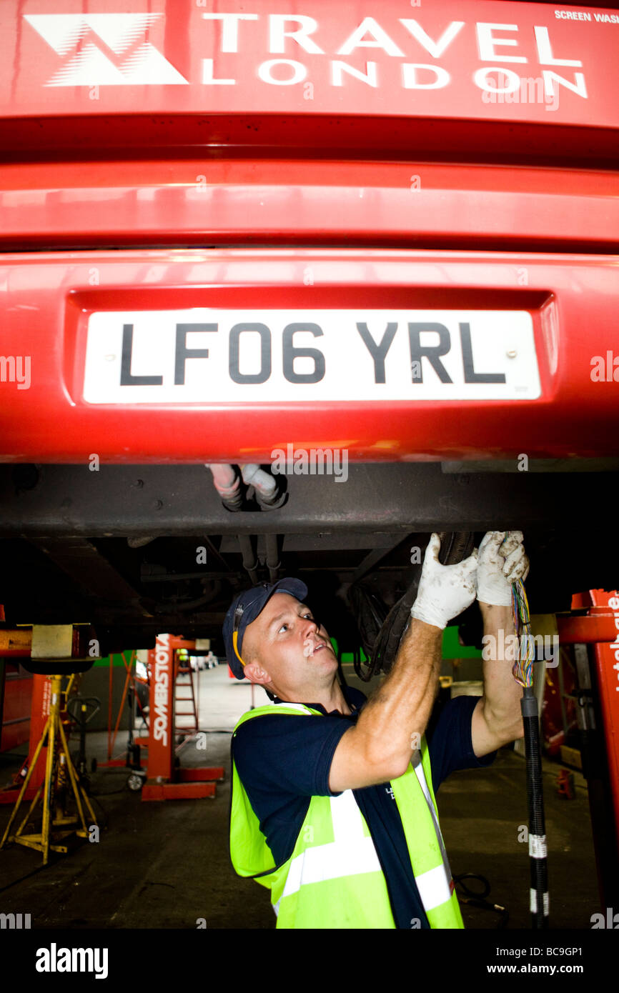 bus mechanic technician fix double decker London Stock Photo - Alamy