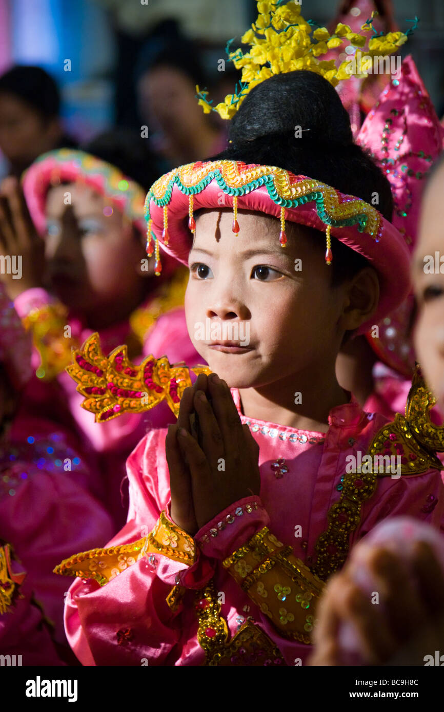 Portrait of a seriously praying child during the Shin-byu-ceremony in ...