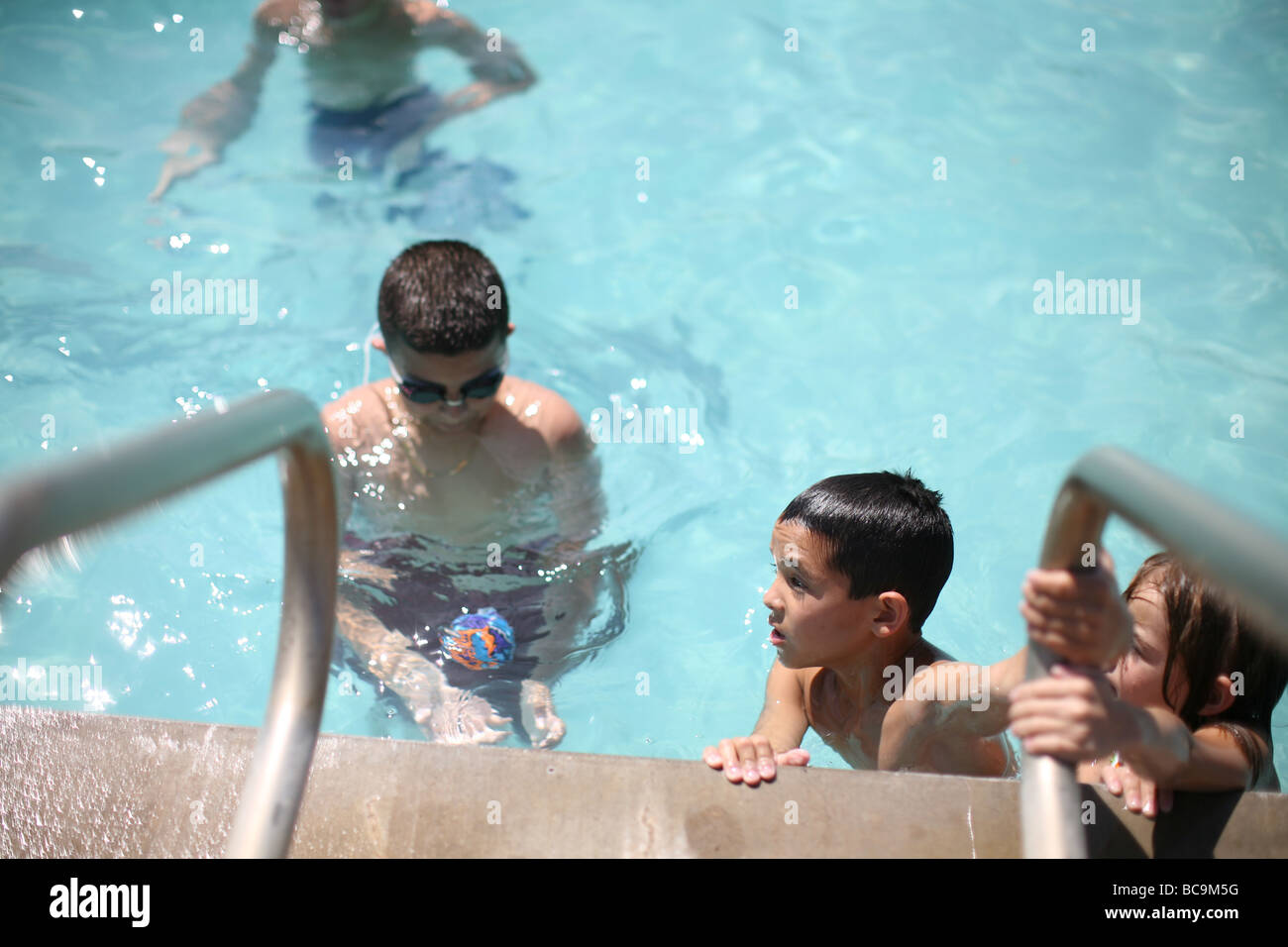 Swimming in swimming pool hi-res stock photography and images - Alamy