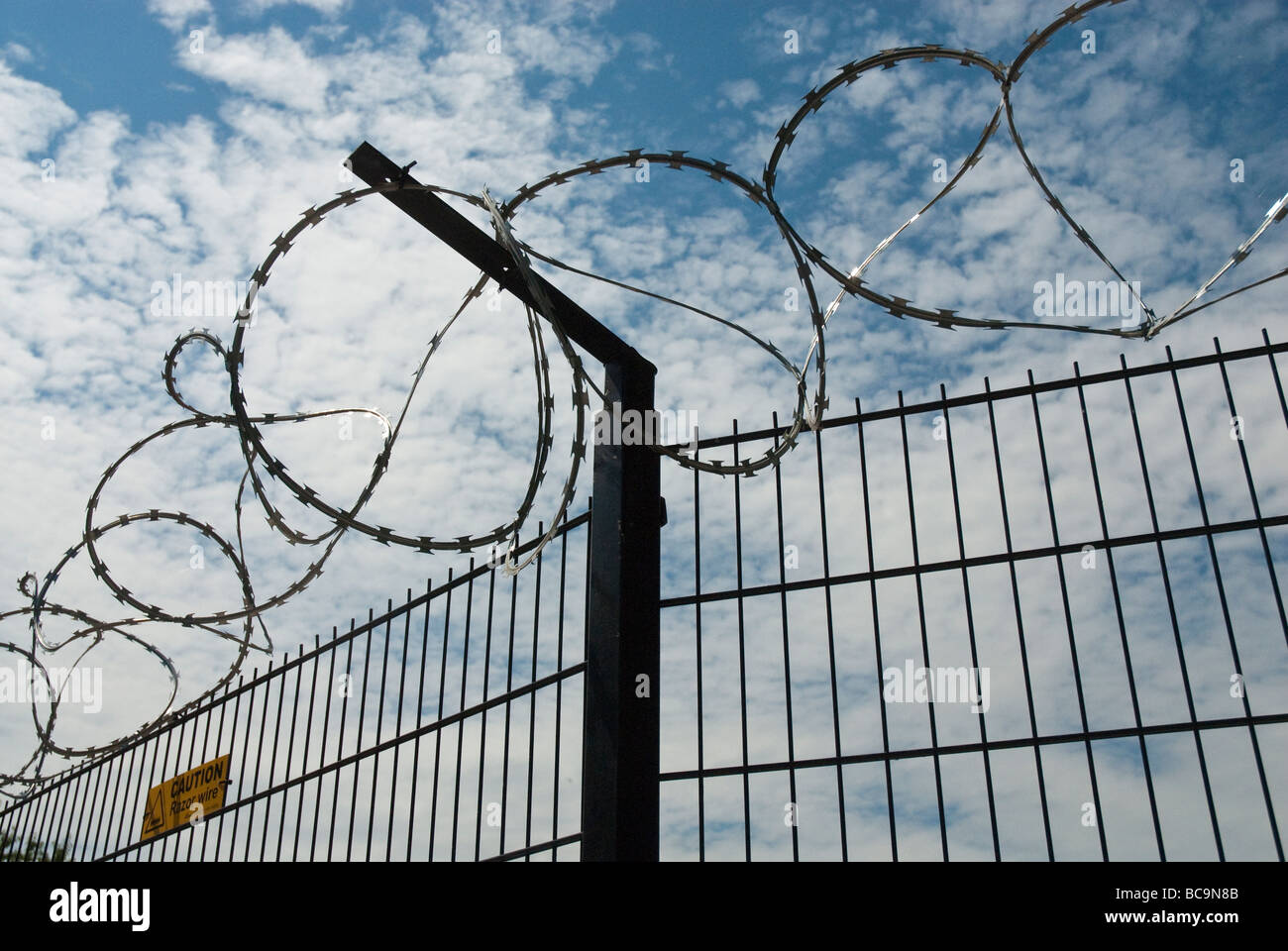 Razor Wire Security fence Stock Photo - Alamy